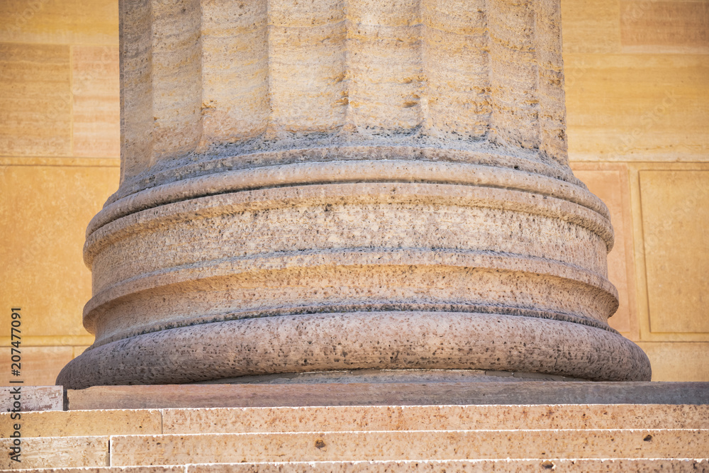 Stone fluted column base, made of dolomite, on the exterior of the ...