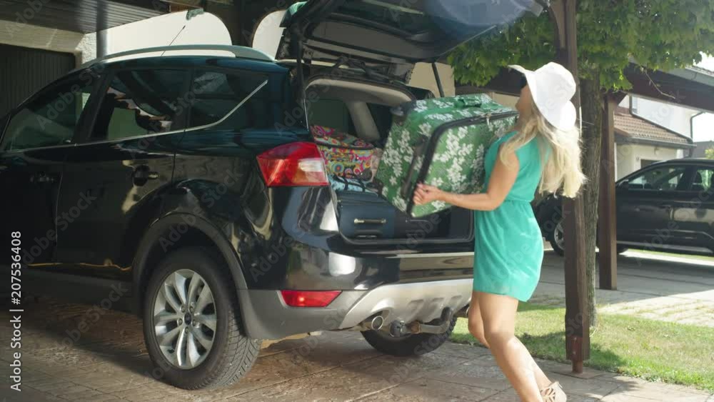 SLOW MOTION, LENS FLARE: Excited young woman struggles to close the ...