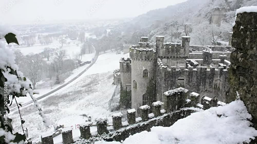 Gwrych castle Abergele, Welsh European castle in gently falling snow ...