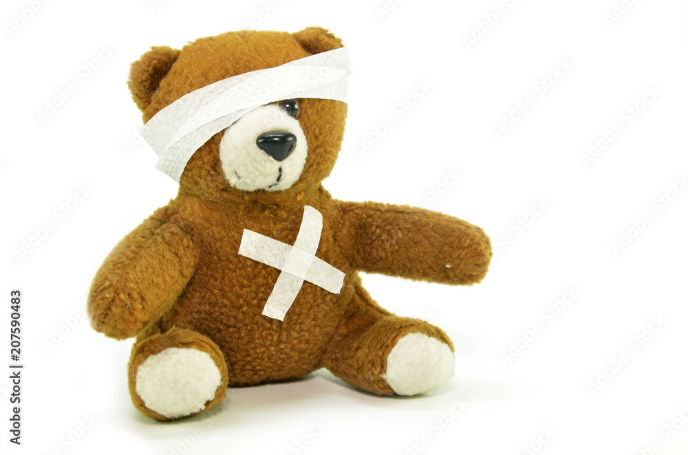 Injured teddy bear with bandages Stock Photo | Adobe Stock