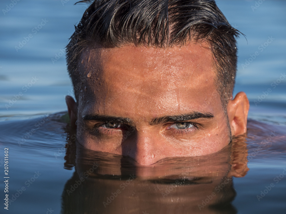 Person Underwater Looking Up