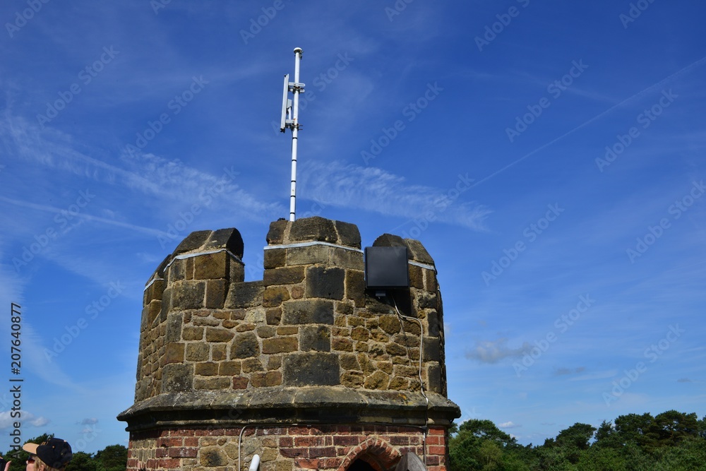 Turret at the top of a tower in Surrey. Stock Photo | Adobe Stock