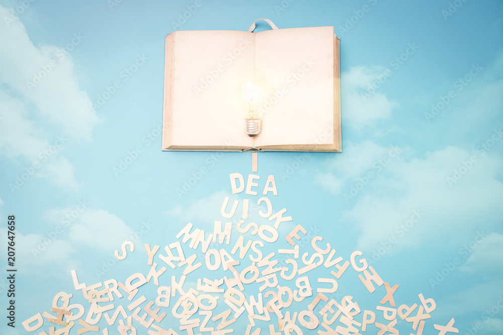 knowledge and idea concept, light bulb flying on sky and releasing ...