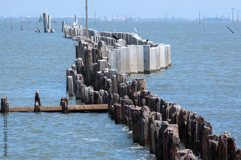 Concrete barrier in sea level rise in gulf of thailand Stock Photo ...