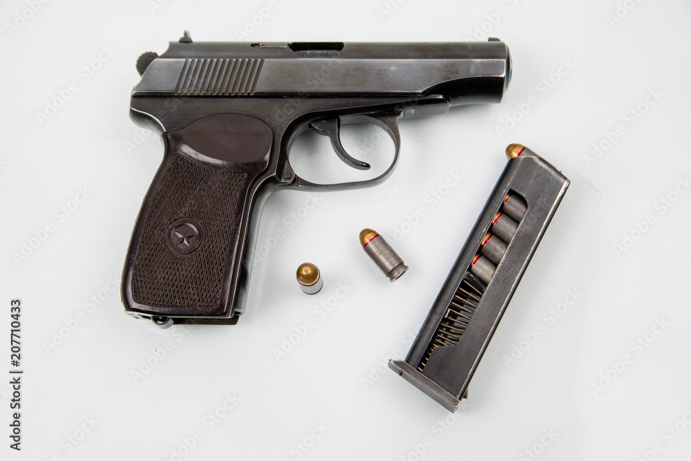 Makarov's pistol in his hand and ammunition to him ภาพถ่ายสต็อก | Adobe ...