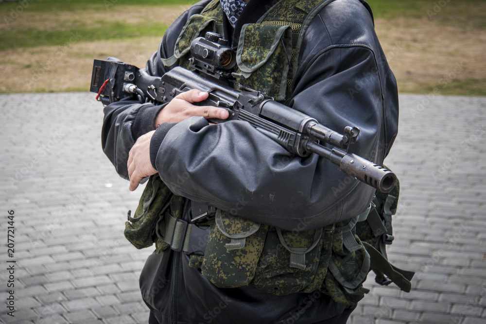 man aiming with an AK-47 with reflex sight, separatist. Male mags in ...