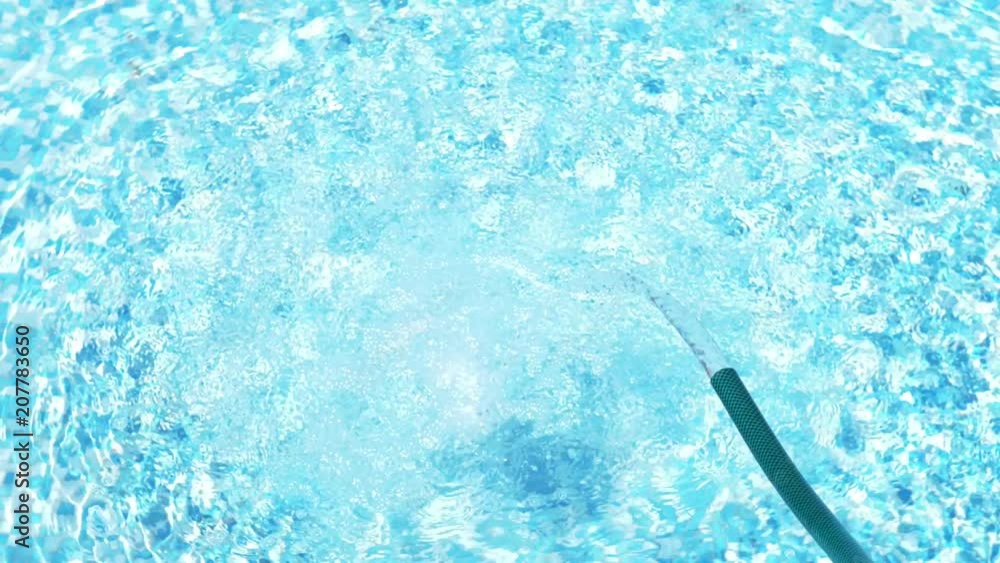 Pool Water Background Loop. 4k, close-up. water flows into the pool ...