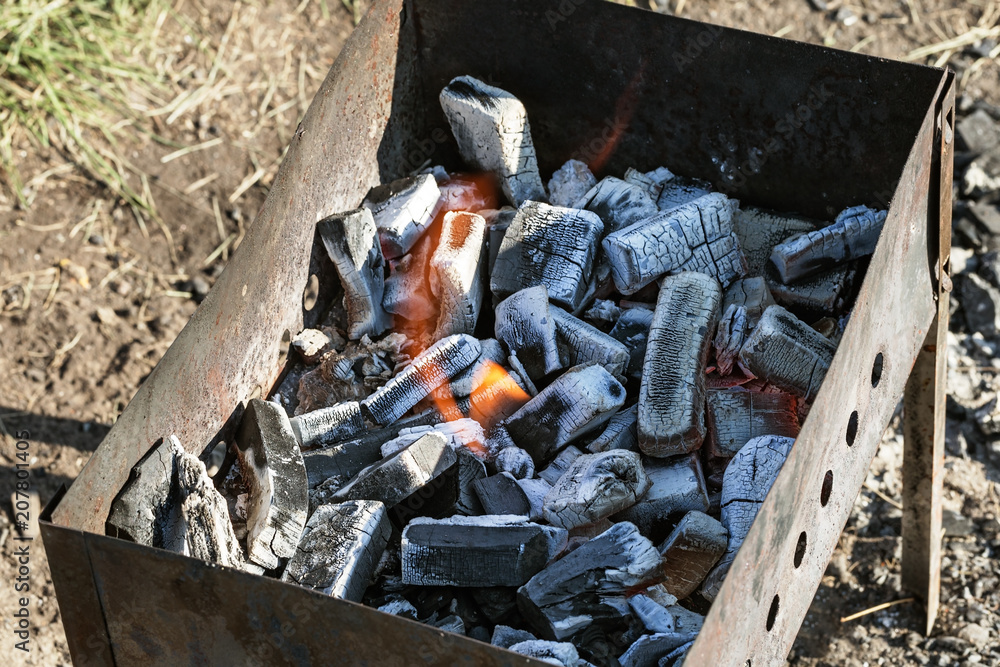 Burnt coals for barbecue in the old open air grill. Burning coals in ...