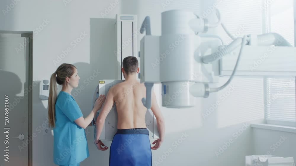 In the Hospital, Man Standing Face Against the Wall While Medical ...