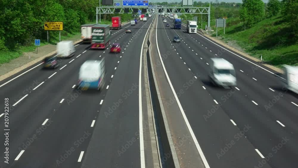Time lapse of road traffic on the M1 smart four lane motorway with no ...