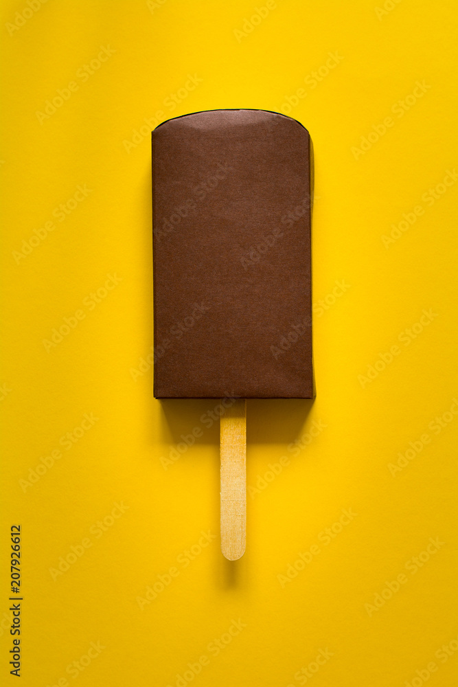 Summer holiday or non-organic food concept. Woman hand holding paper ...