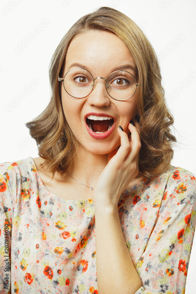 vertical close-up portrait of young woman with vivid emotion surprise ...
