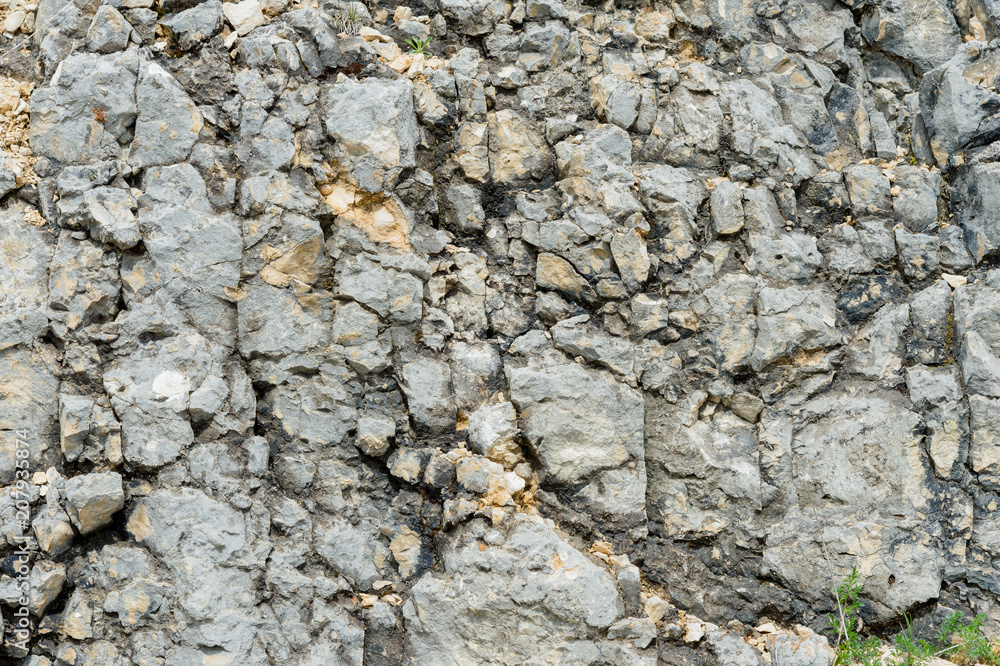 Textured stone background Rubble ballast in natural form in the rock ...