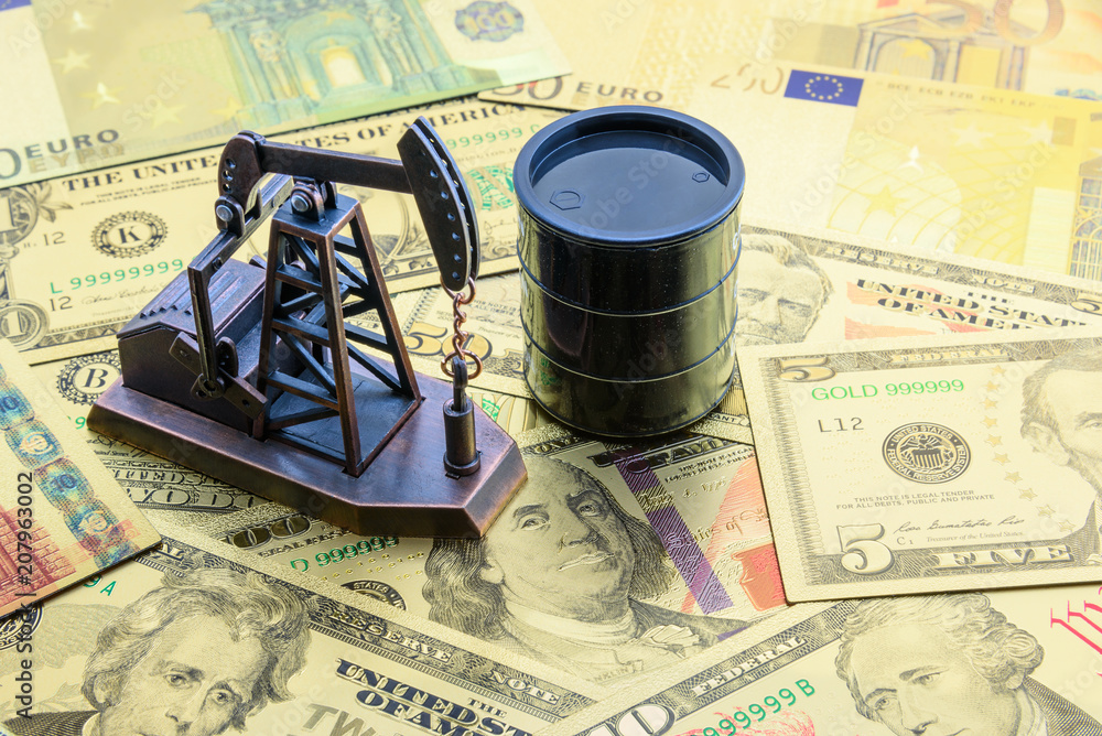 Petroleum, petrodollar and crude oil concept : Pump jack and a black ...