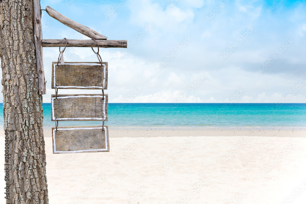Blank Wooden Sign On a Sand beach and Beautiful sea background in ...