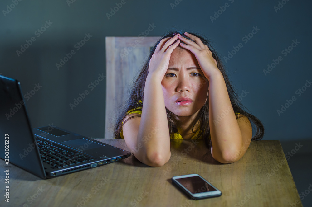 dramatic portrait scared and stressed Asian Korean teen girl or young ...