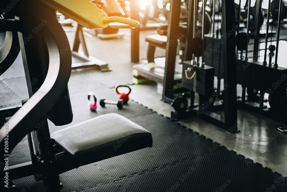 Empty fitness gym with equipment interior at morning with sunrise ...