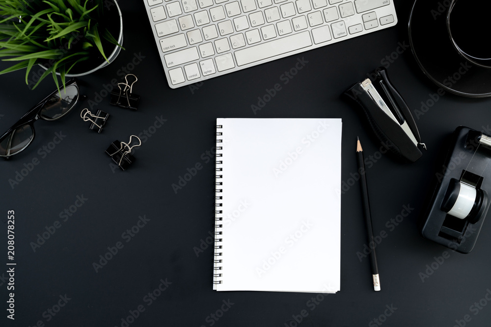 Flat lay of top view modern black desk work table with computer laptop ...