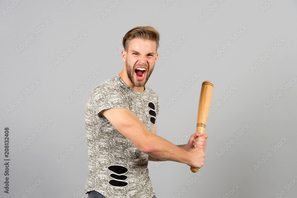 Bully man shouting aggressive face, grey background. Man with wooden ...
