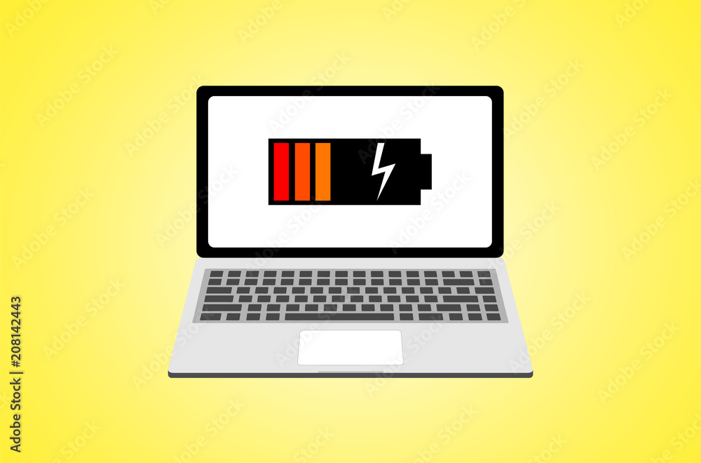 The laptop with an icon of the low battery on the screen on a yellow ...
