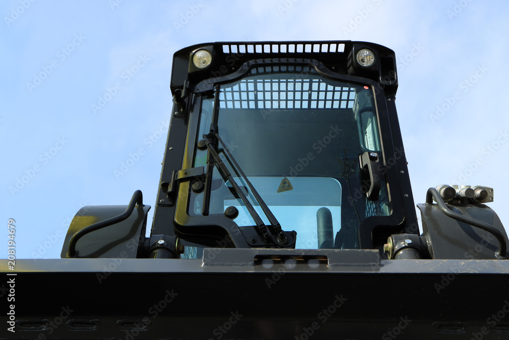 Cab of a modern wheel loader. Stock Photo | Adobe Stock