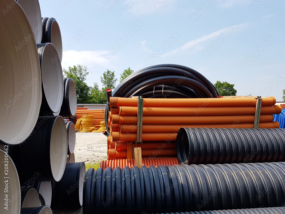 A warehouse of plastic pipes for various purposes, diameter and color ...