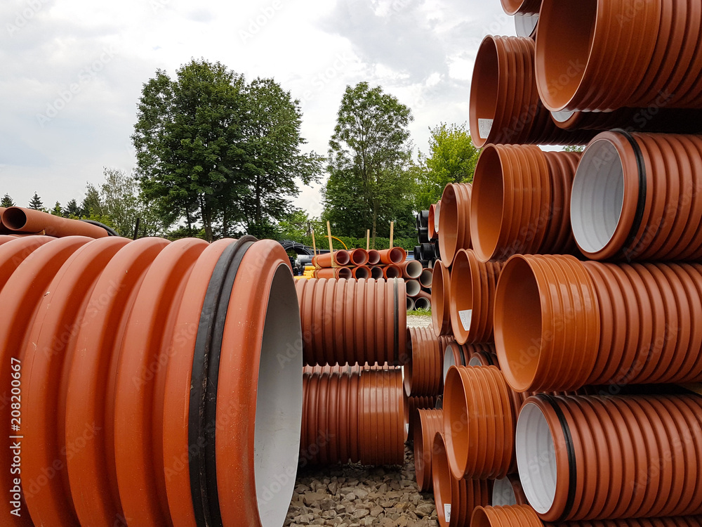 A warehouse of plastic pipes for various purposes, diameter and color ...