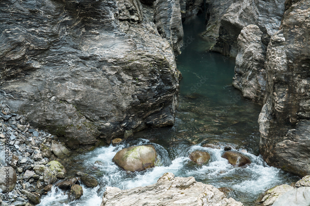 Rhine in the Alps, Viamala Gorge. Mountain river makes its way between ...