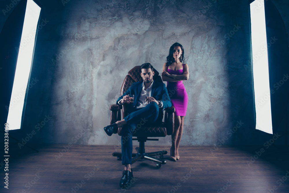 Full size portrait of virile harsh boss in formal wear sitting in ...