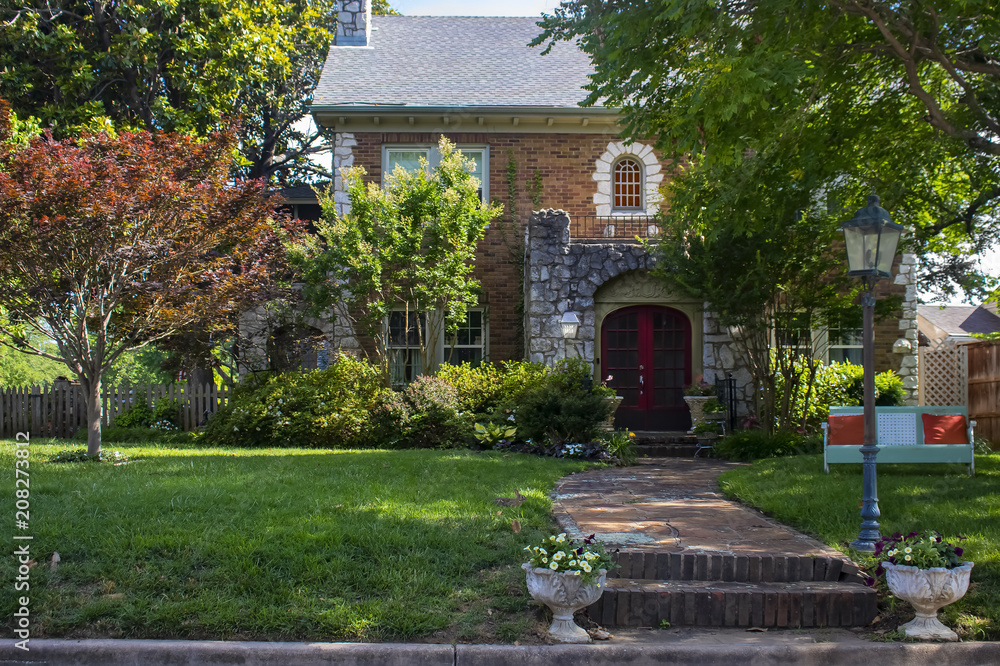 Beautiful upscale house with rock castle like entrance and retro metal ...