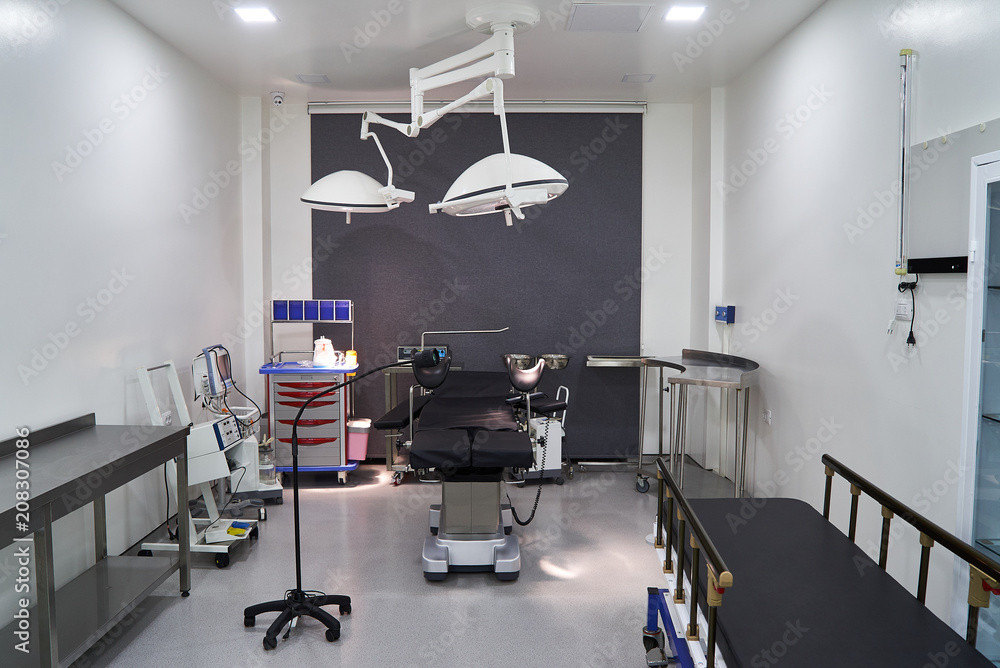 Hospital room interior with beds and comfortable medical equipped ...