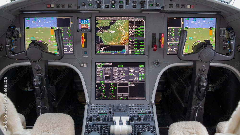 Modern glass digital cockpit of an passenger aircraft. Stock Photo ...