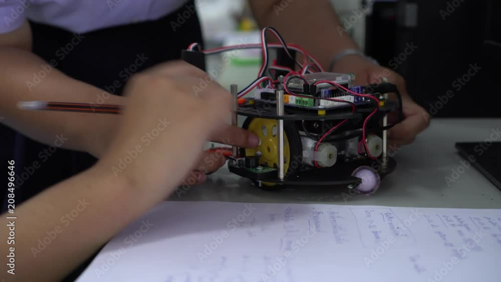 Learning STEM Education robotics project concept: Asian Student group ...