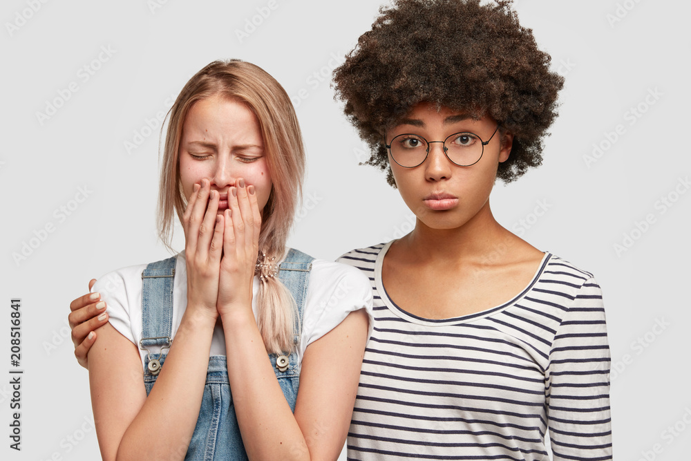 Please, don`t cry! Lovely dark skinned female has crisp bushy Afro ...