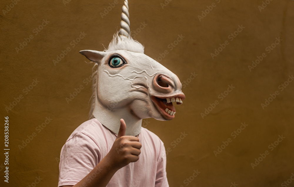 Unicorn funny plastic mask photograph Stock Photo | Adobe Stock