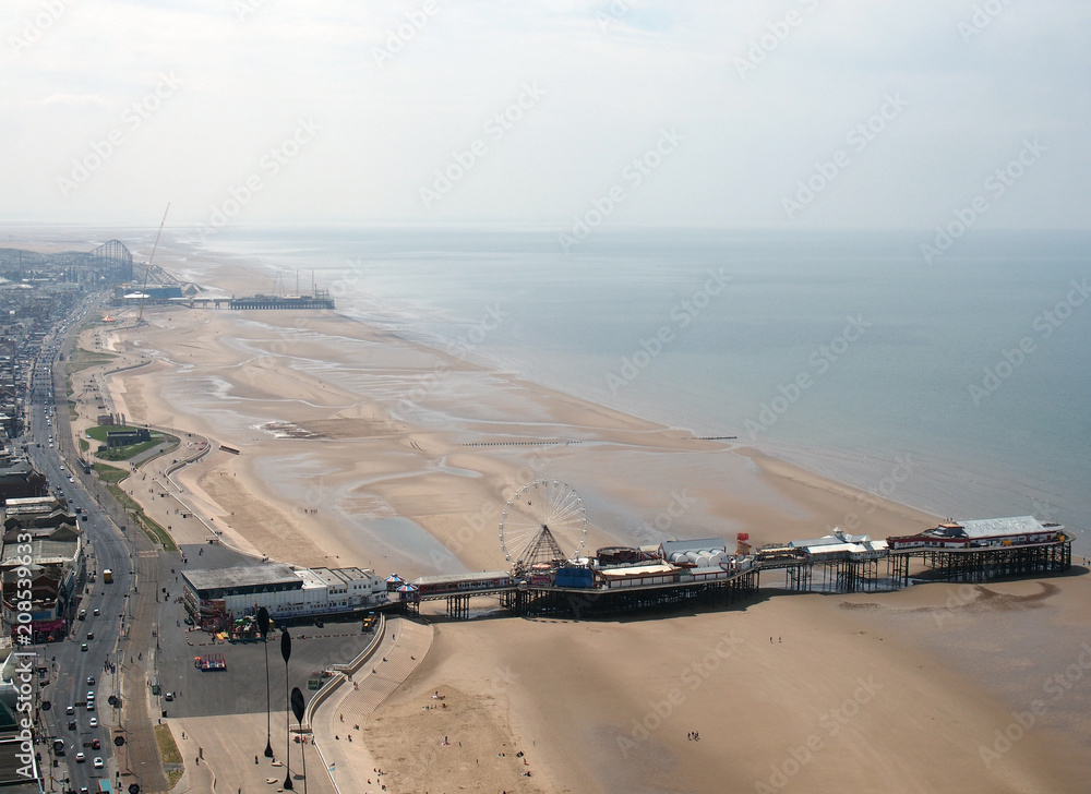 aerial view of blackpool looking north showing the beach at low tide ...