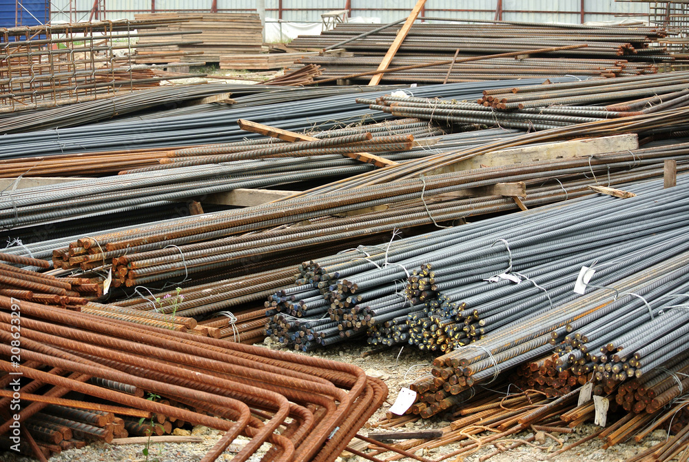 Construction workers working at the steel reinforcement bar bending ...