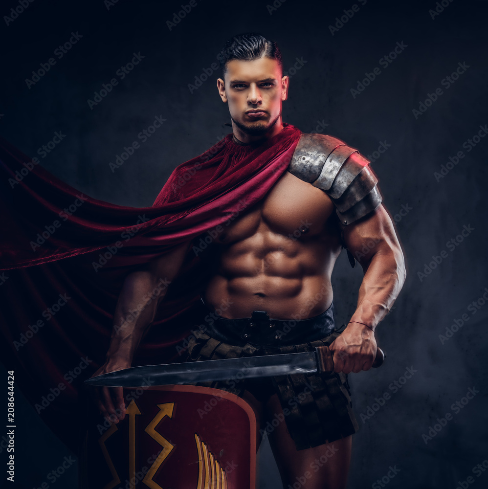 Brutal ancient Greece warrior with a muscular body in battle uniforms ...