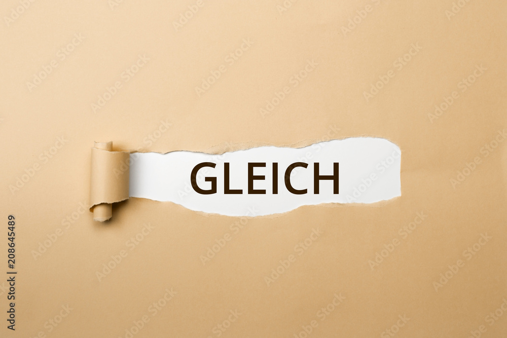 GLEICH Schriftzug - aufgerissenes Papier Stock Photo | Adobe Stock