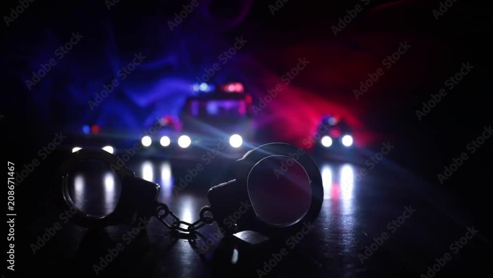 Police raid at night and you are under arrest concept. Silhouette of ...