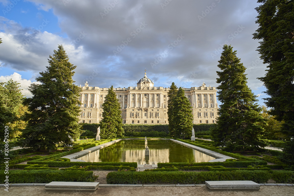 North facade of Royal Palace of Madrid (Palacio Real) at sunset. View ...
