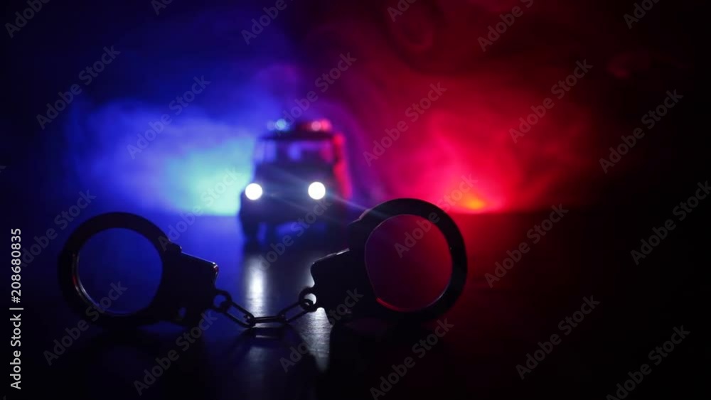 Police raid at night and you are under arrest concept. Silhouette of ...