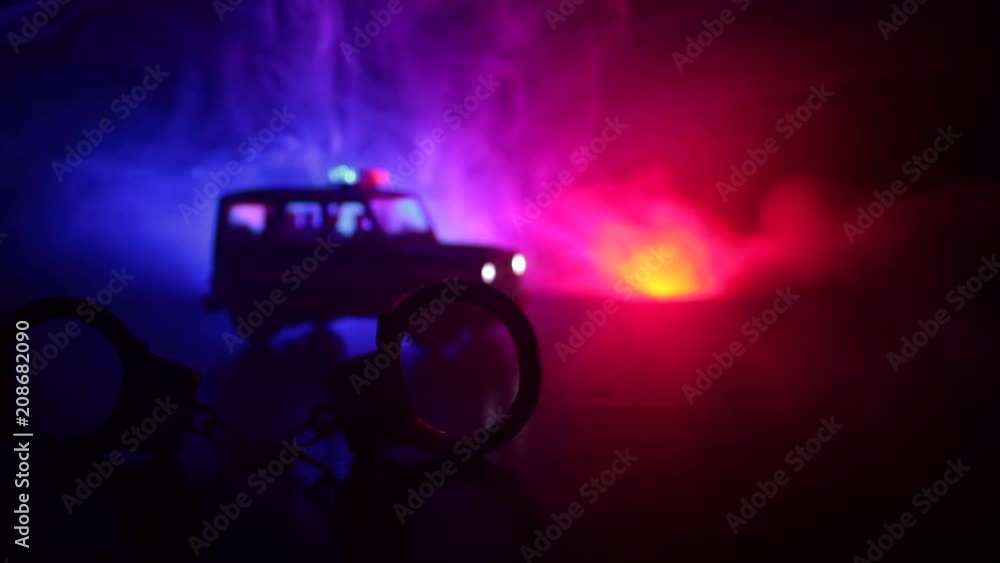 Police raid at night and you are under arrest concept. Silhouette of ...