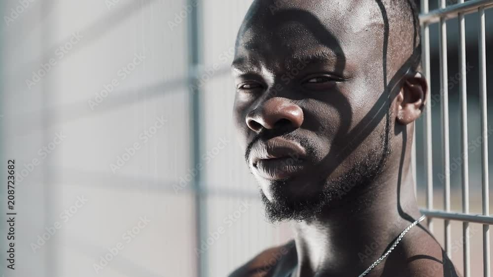 Confident and angry african american man looking at camera - outdoor ...