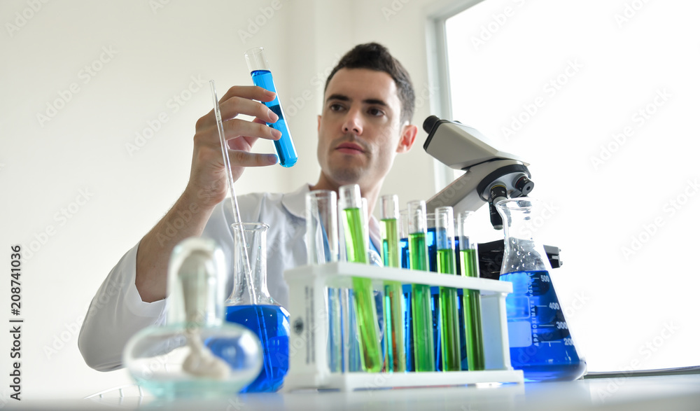 Research Scientist is Using Micropipette Filling Test Tubes. Stock ...