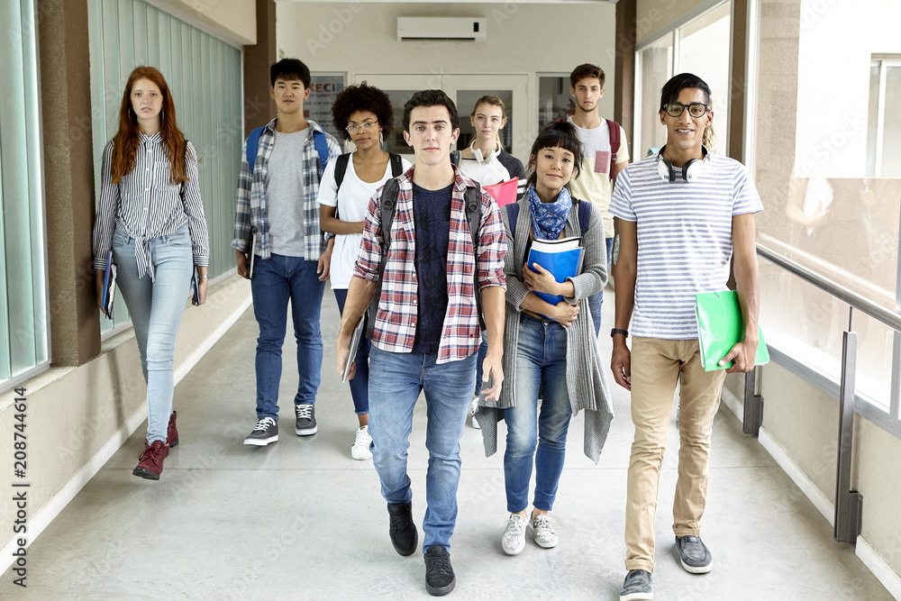 Students walking in school corridor Stock Photo | Adobe Stock