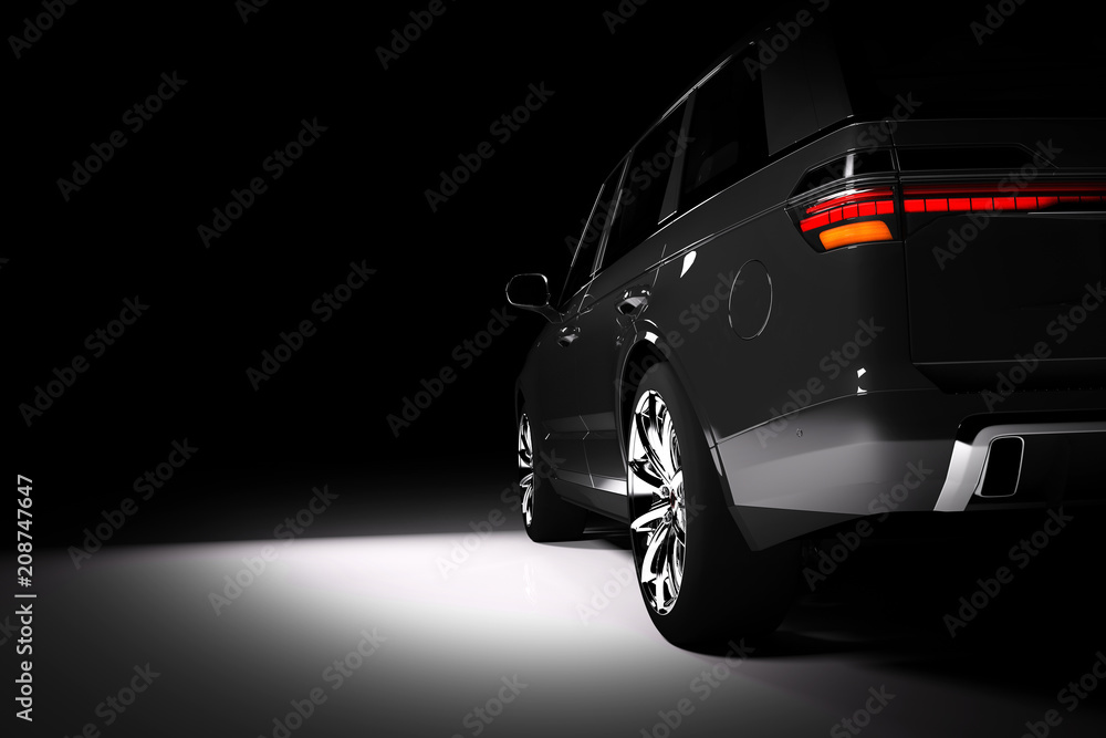 Back view of modern black SUV car in a spotlight Stock Photo | Adobe Stock