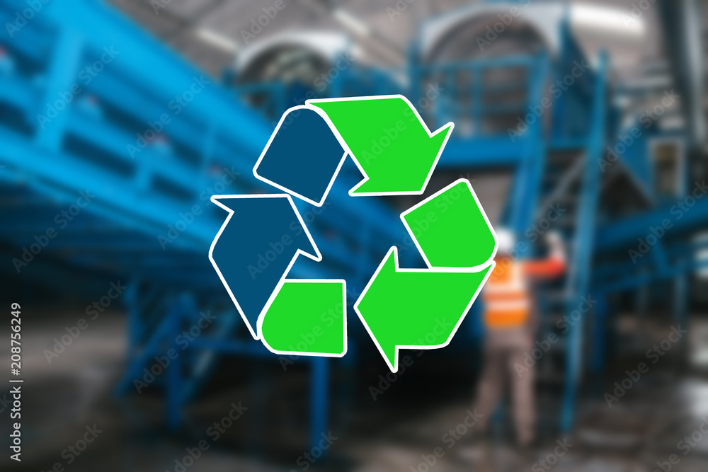 Sign recycling waste. The waste sorting and processing plant is blurry ...