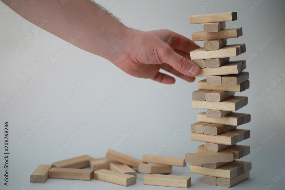 Board game jenga tower of wood sticks Stock Photo | Adobe Stock