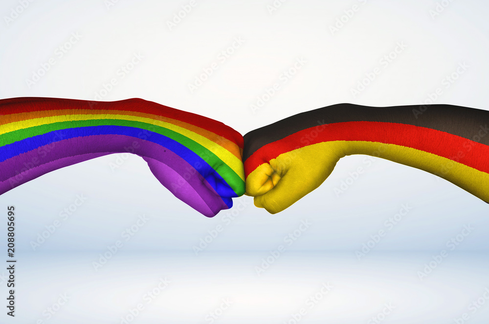 Fist bump of German and Pride Flags. Two hands with painted flags of ...